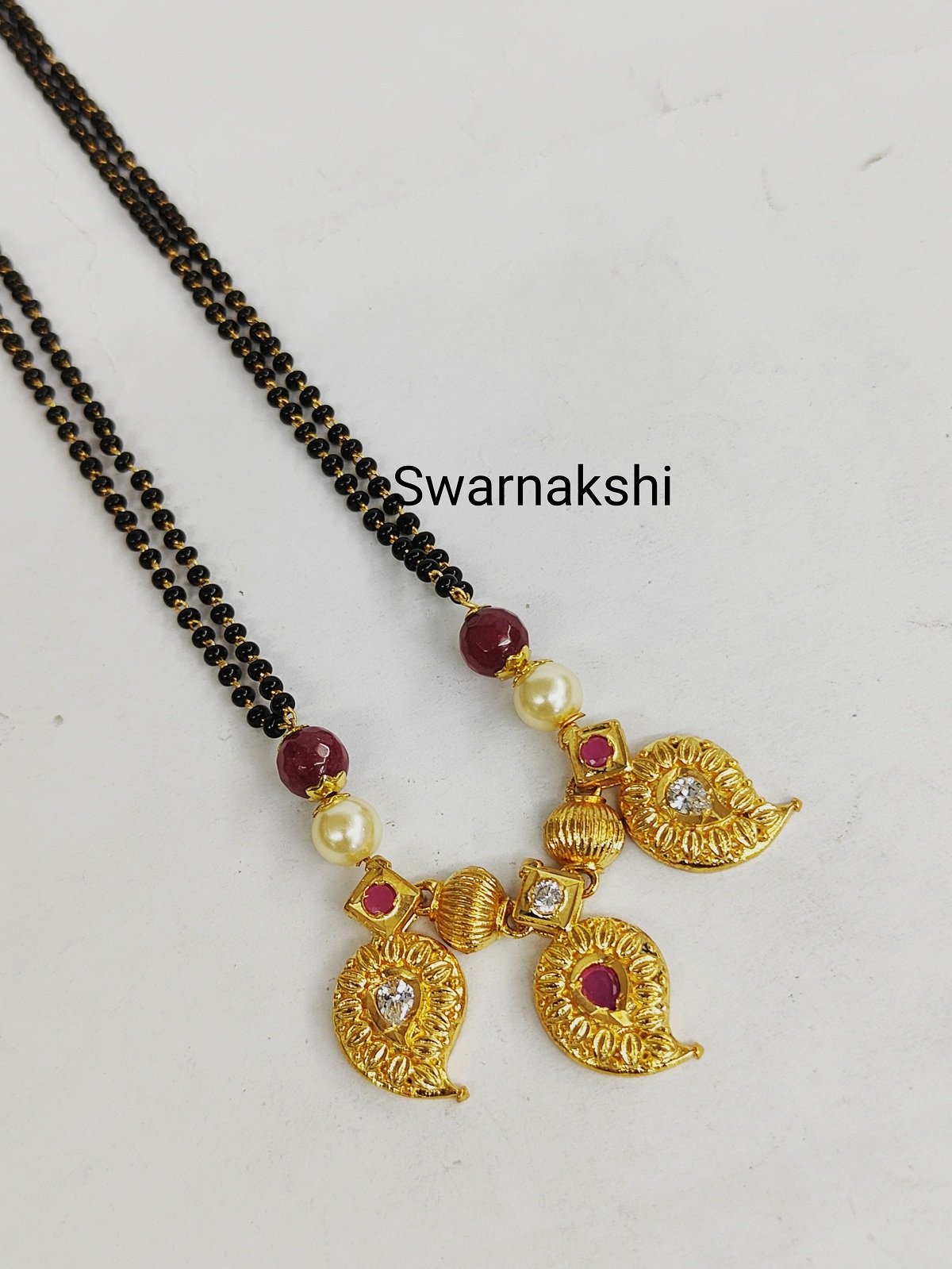 Black beads mangalsutra chain with mango design pendant - Swarnakshi Jewels
