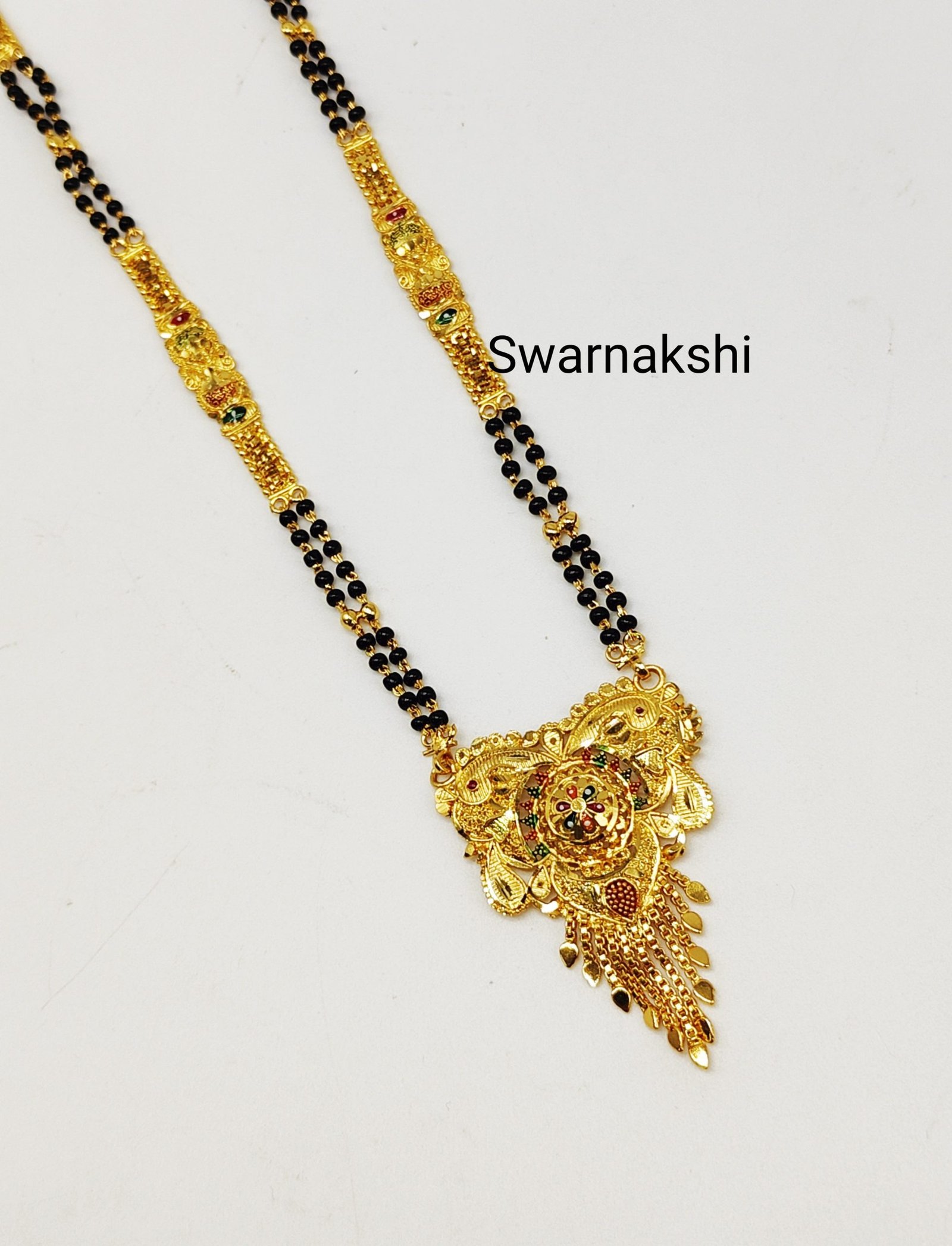 Nallapusalu models with lovely pendant / black beads - Swarnakshi Jewels